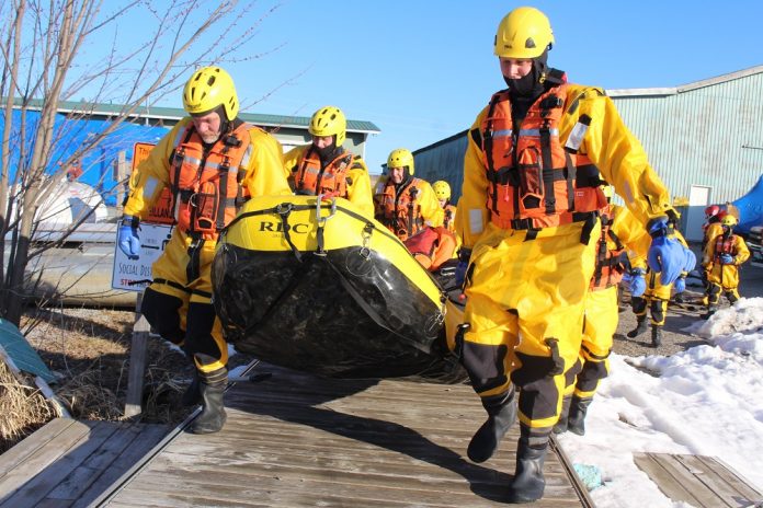 Firefighters get training in frozen lake rescue | The Highlander